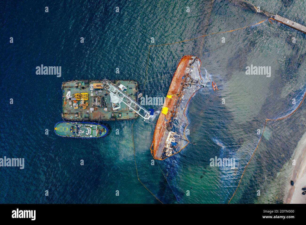 Top view of an old tanker that ran aground and overturned Stock Photo ...