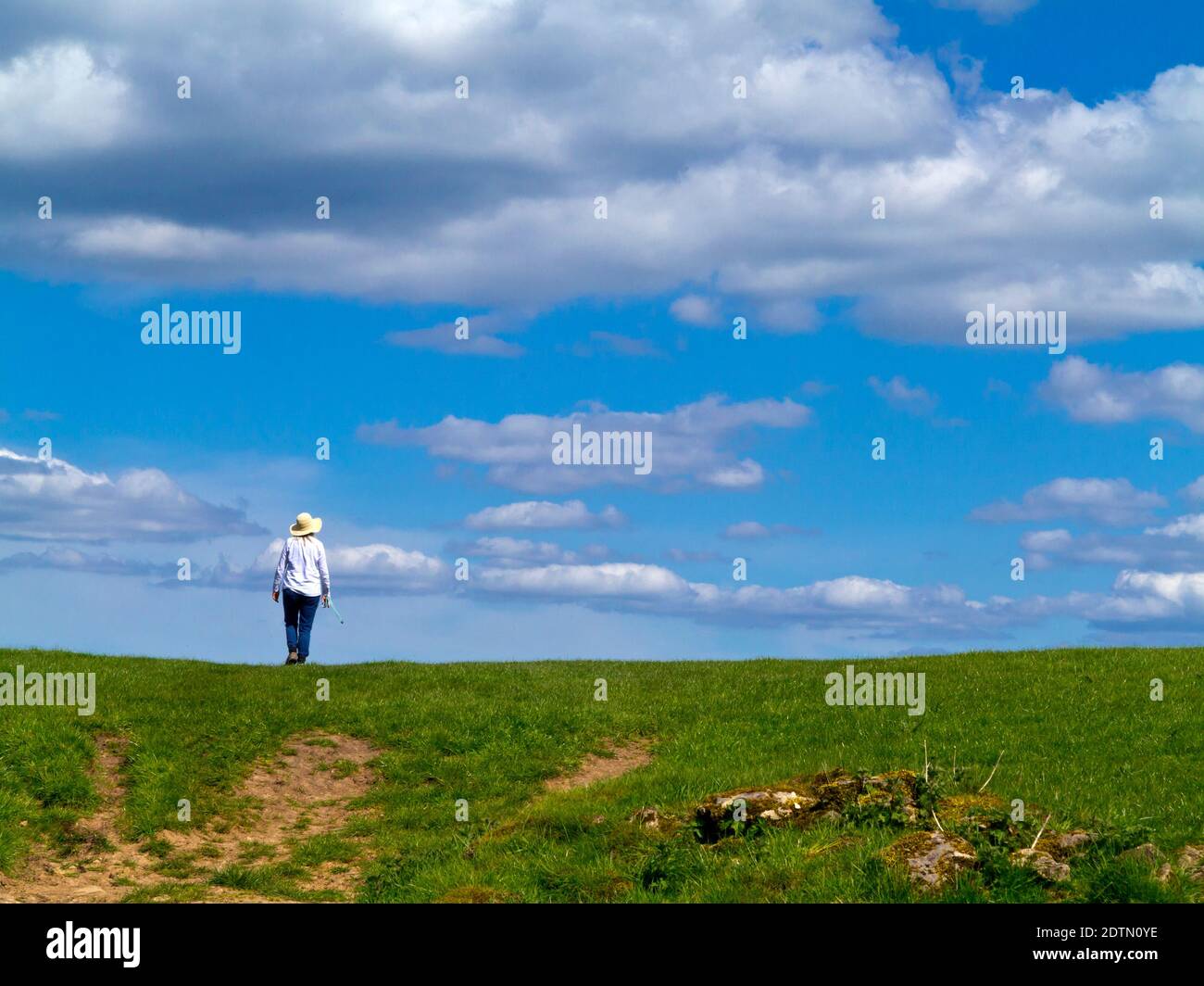 Woman walking alone hi-res stock photography and images - Alamy