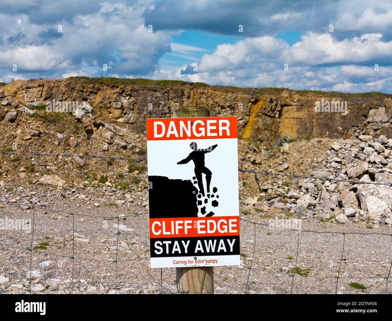 Danger sign at old quarry workings at Longstone Edge in the Peak ...