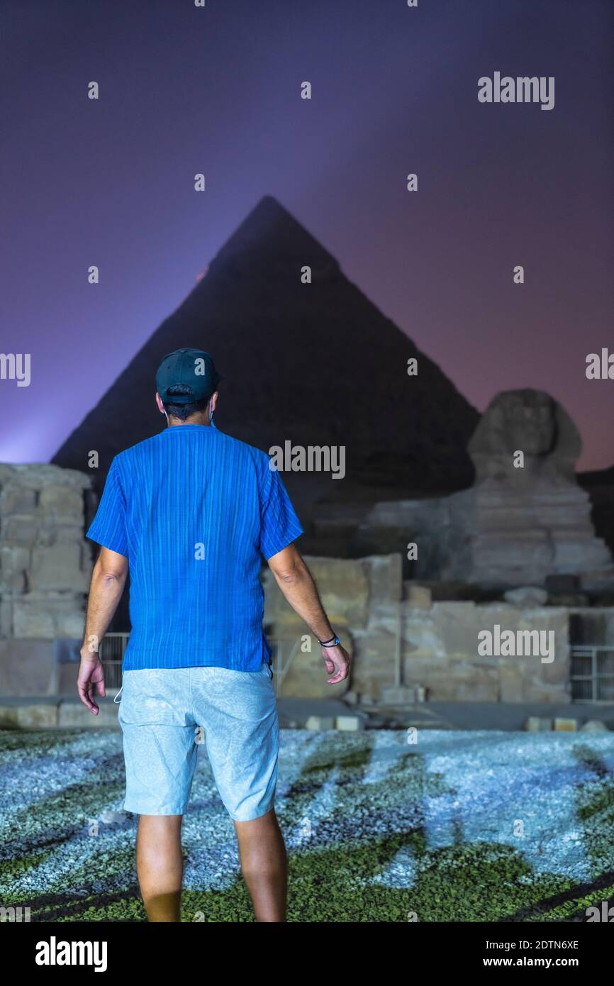 A young European tourist at the sound and light show at the beautiful ...