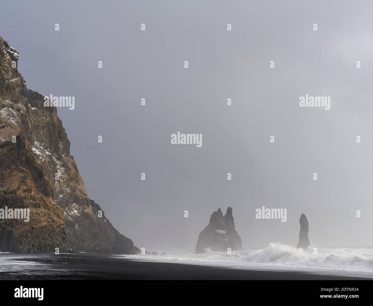 The coast of the north atlantic near Vik y Myrdal during winter. Black ...