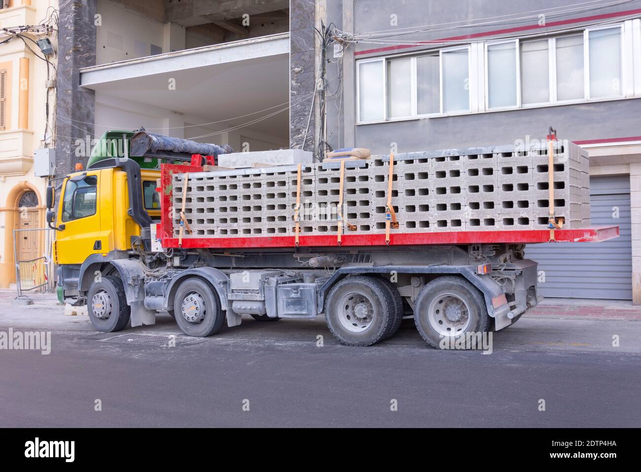 Truck with a fully loaded body of concrete blocks with cement Stock ...
