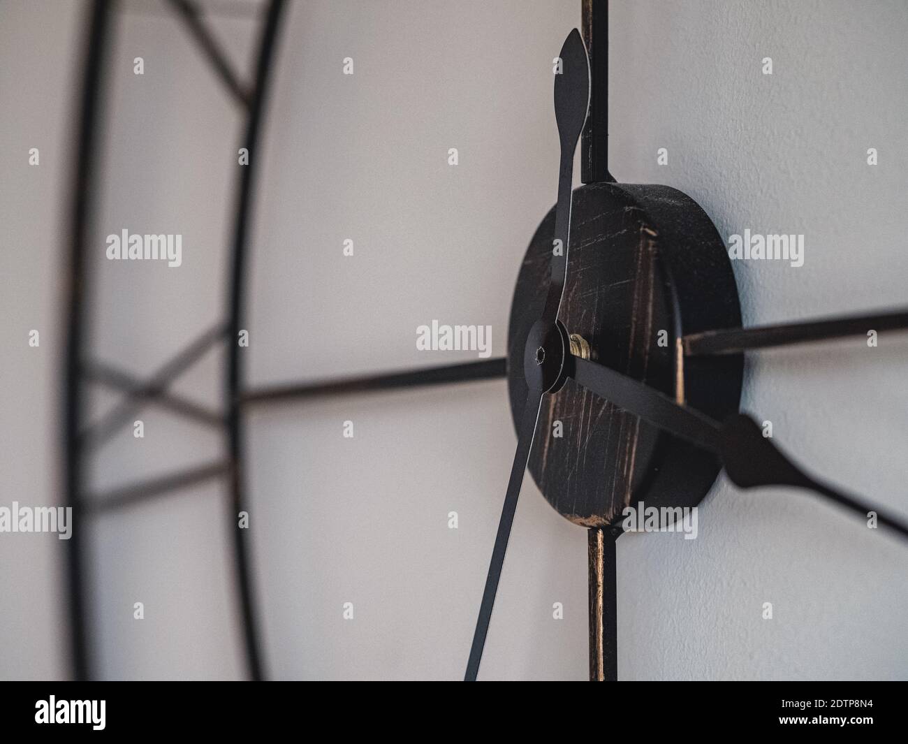 Man hanging on clock hi-res stock photography and images - Alamy