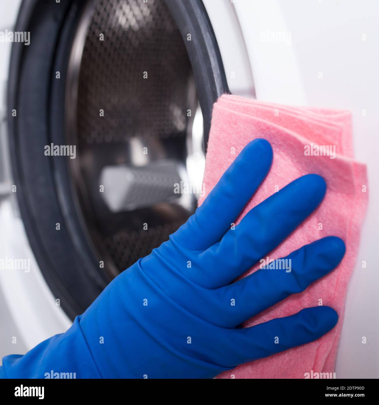 Male washer in gloves hi-res stock photography and images - Alamy