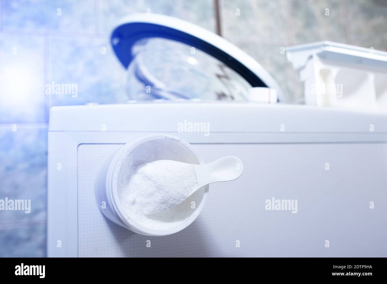 Washing powder with spoon on washing machine, with copy space Stock ...