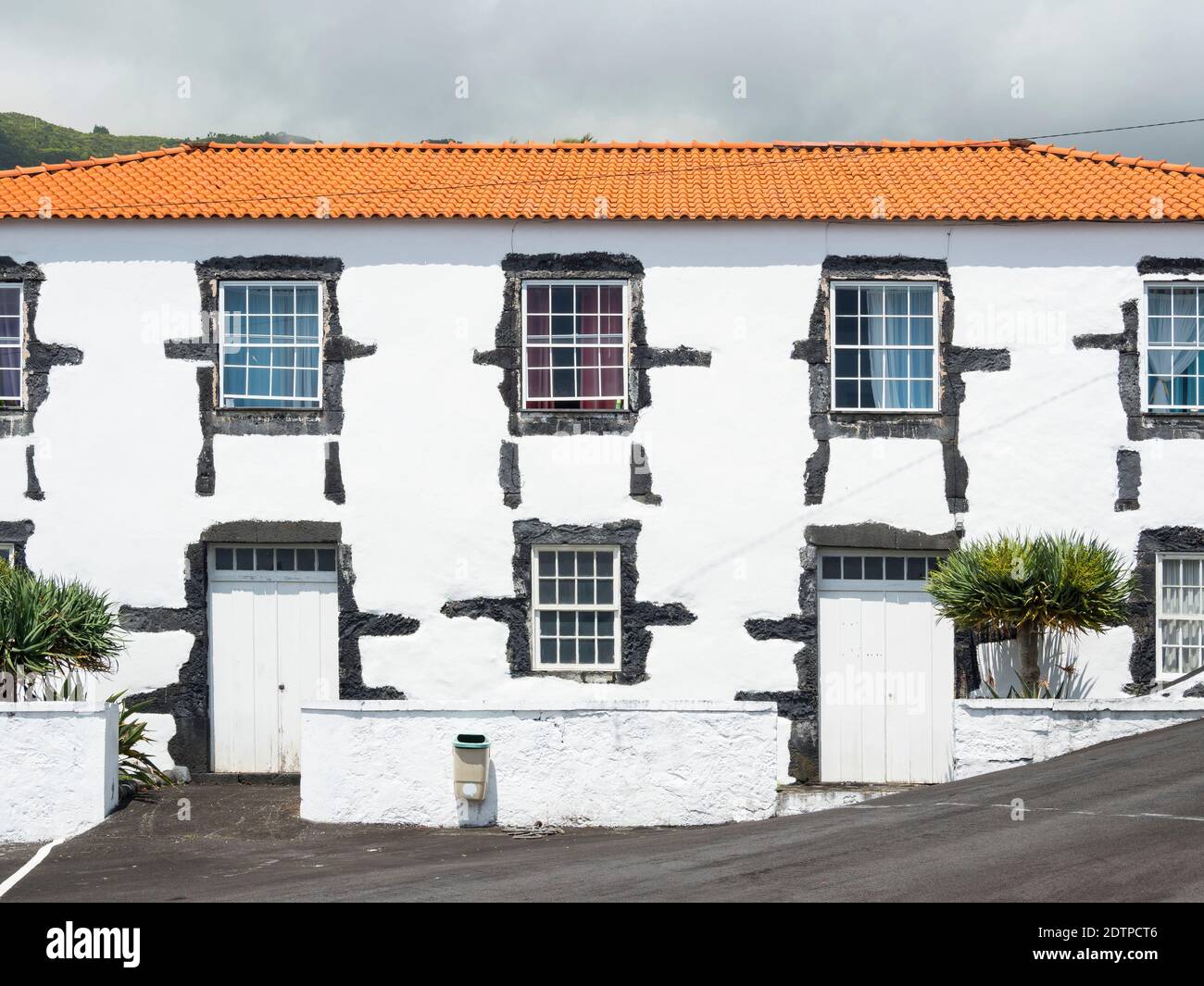 Village Urzelina, traditional building at the harbour. Sao Jorge Island ...