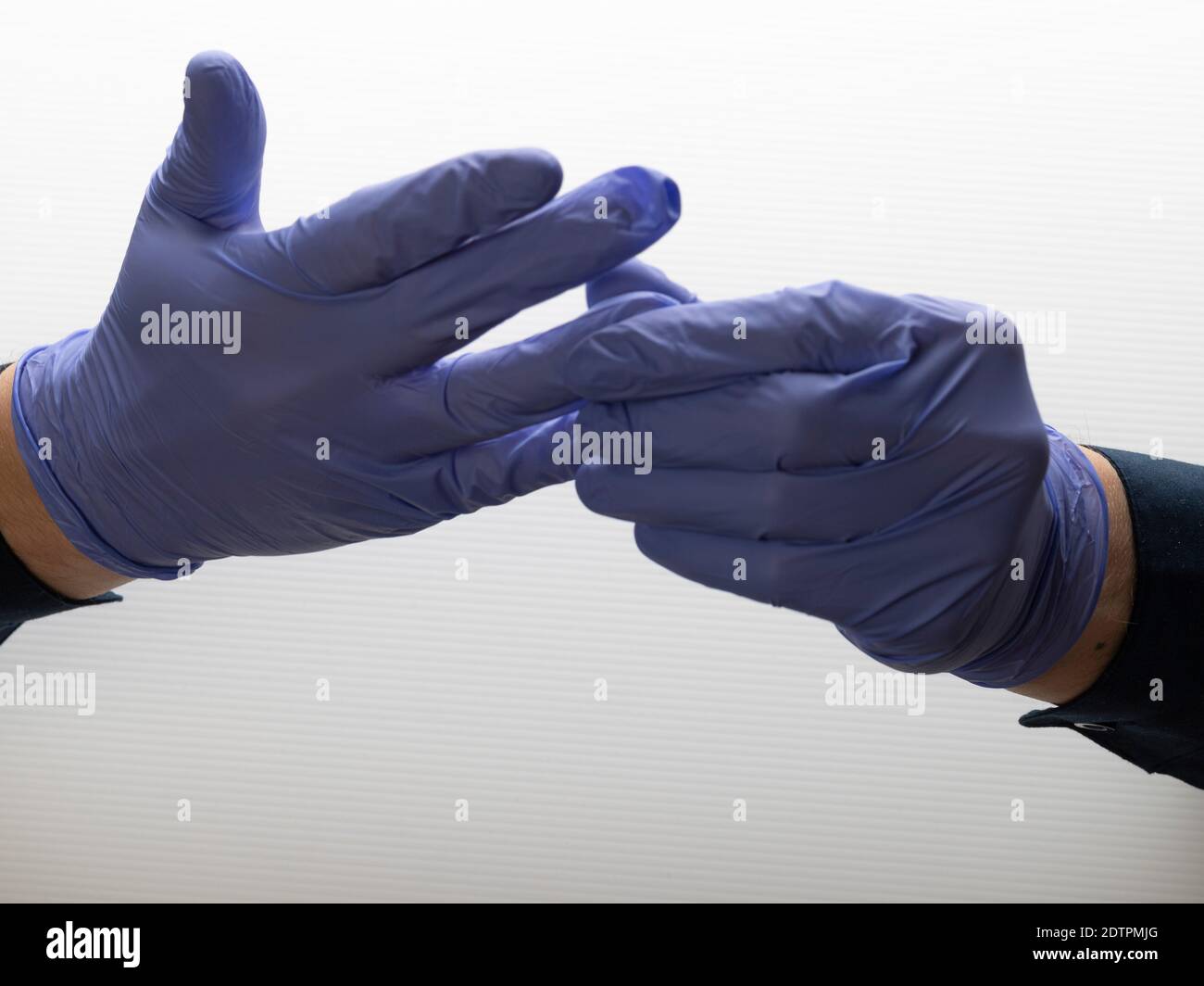 Surgical gloves handshake hi-res stock photography and images - Alamy