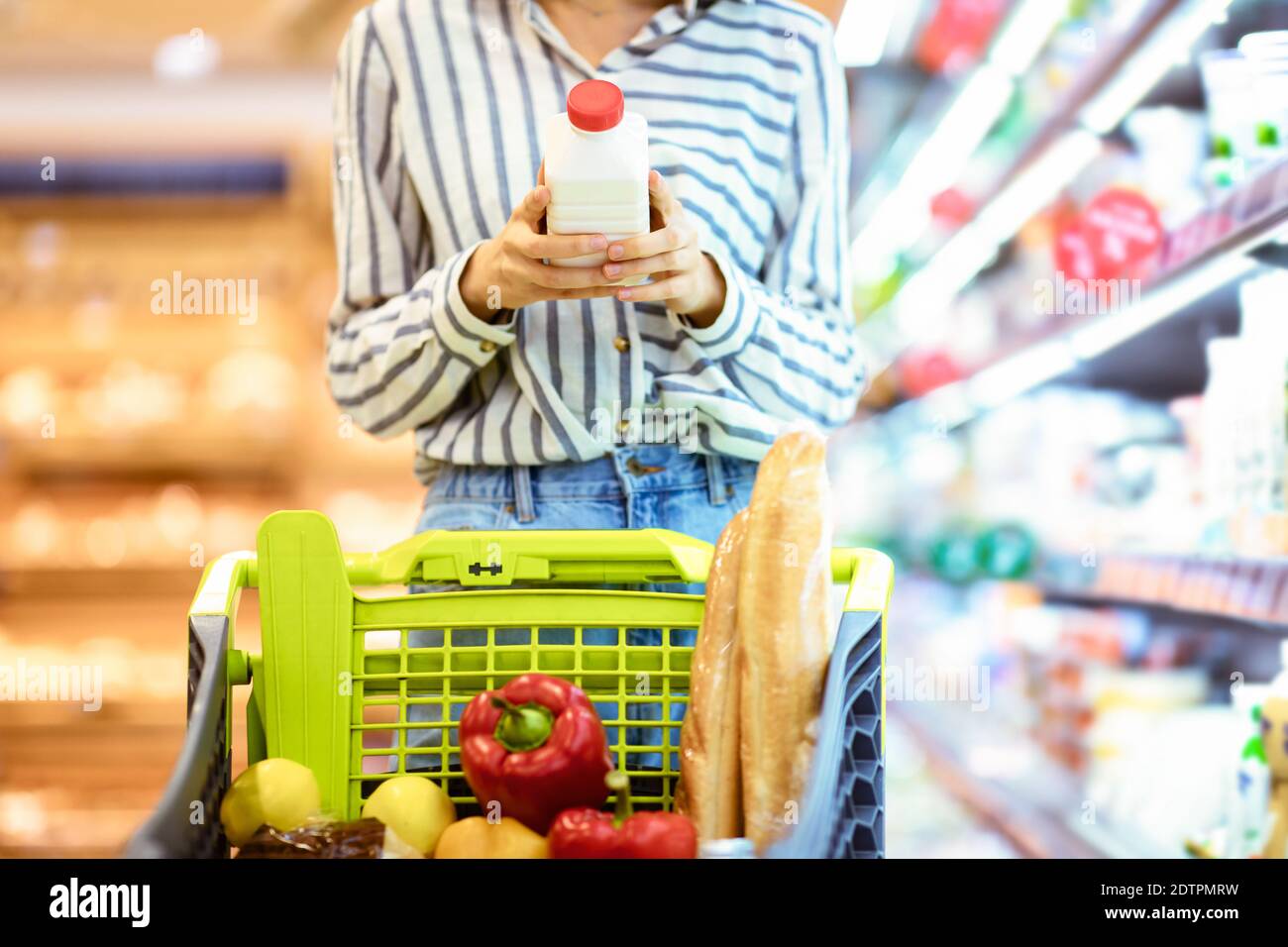 Milk in supermarket trolley in hi-res stock photography and images - Alamy