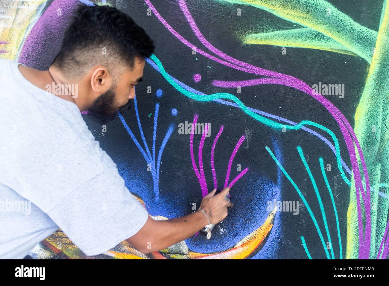 A street artist doing a wall mural in Cebu City, Philippines Stock ...