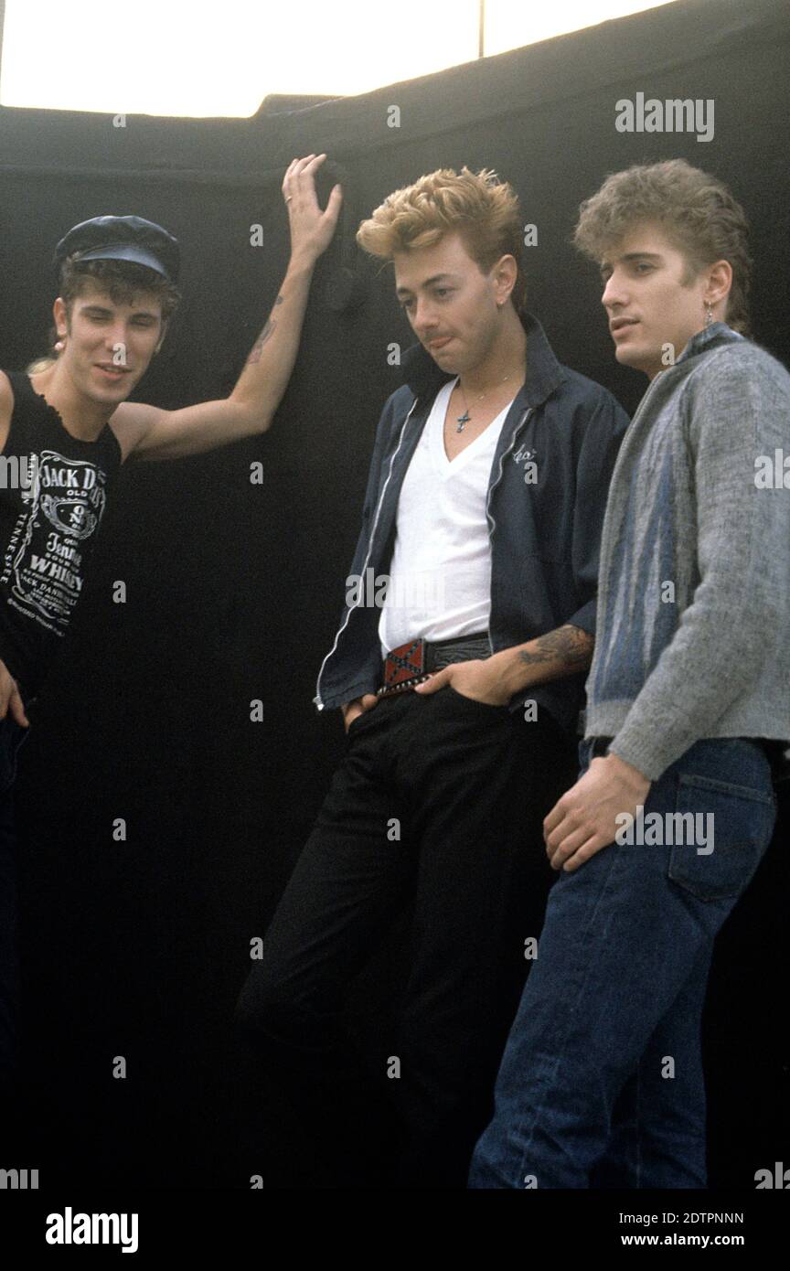 Slim Jim Phantom, Brian Setzer and Lee Rocker of the Stray Cats at a ...