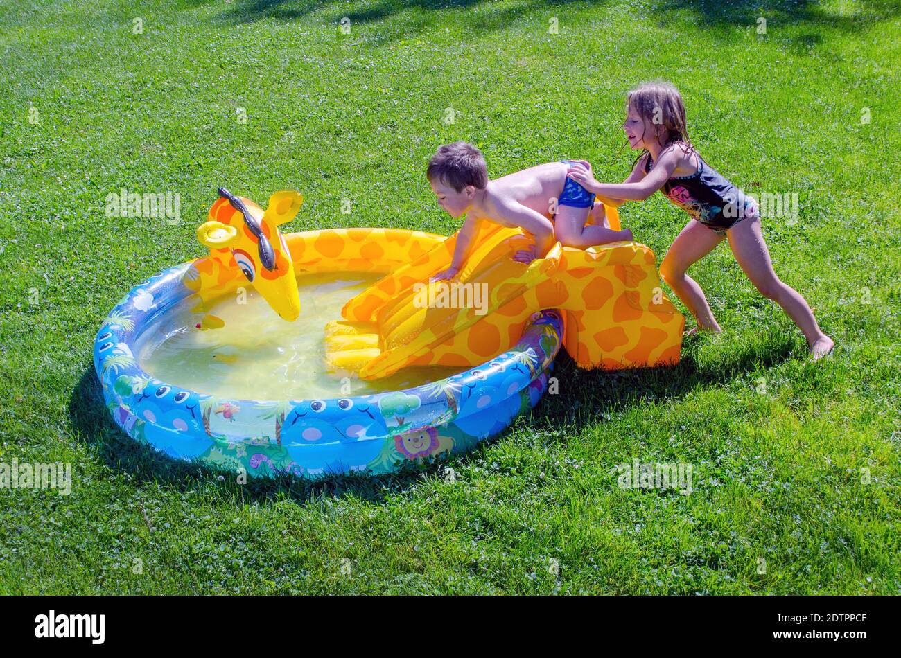 Pushing into pool hi-res stock photography and images - Alamy