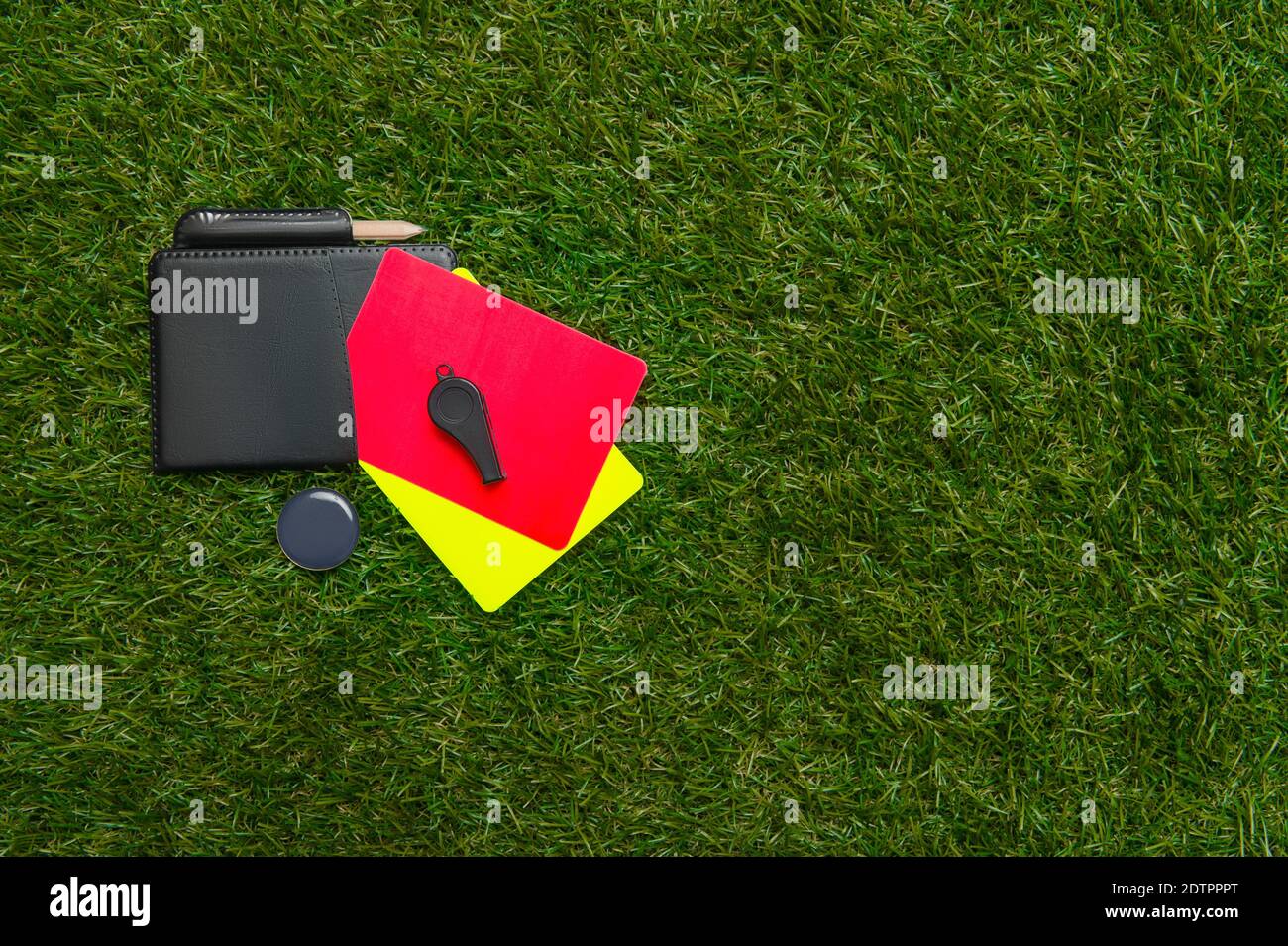 Football soccer referee equipment on green grass background. Top view ...