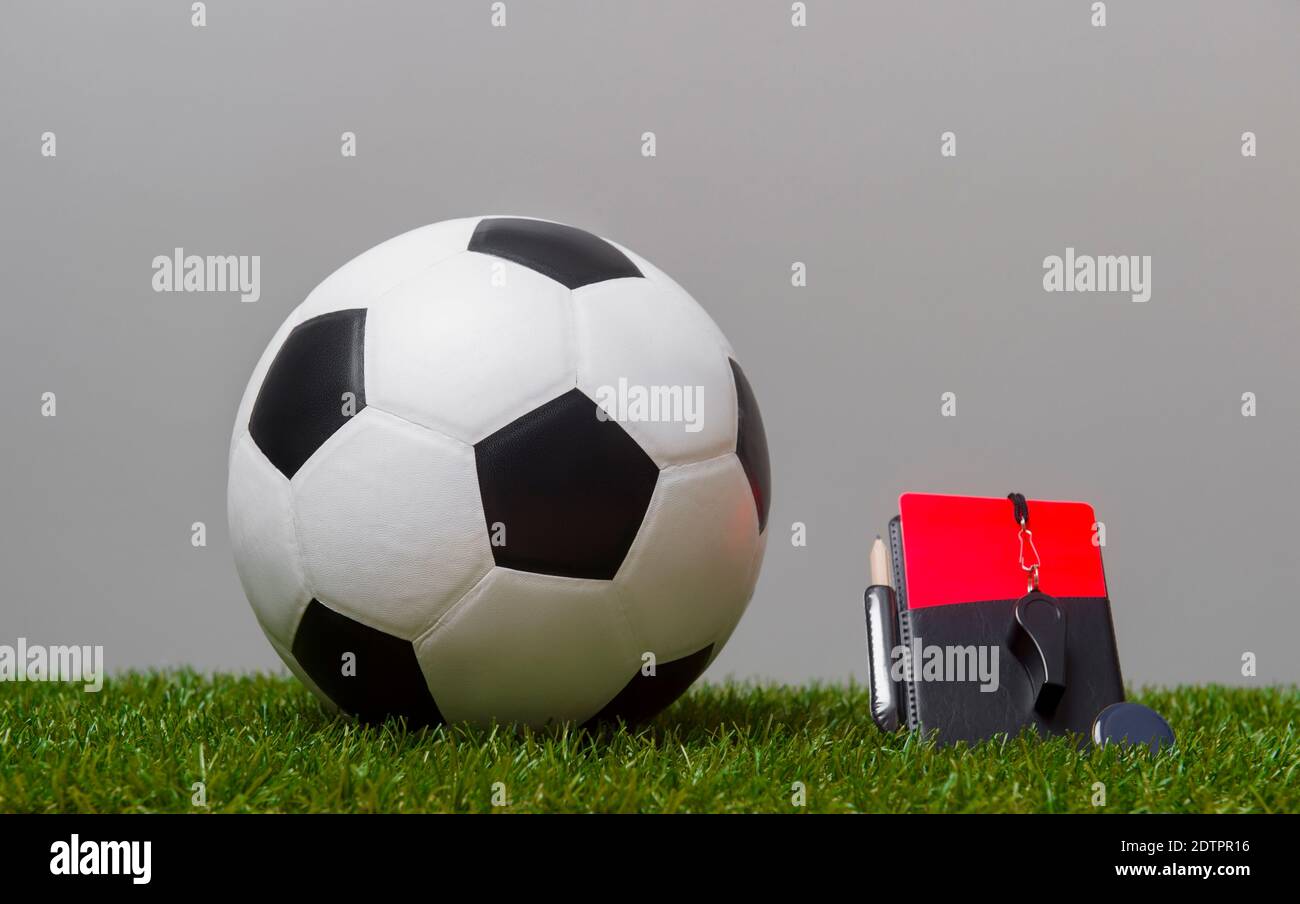 Football soccer referee equipment on green grass background Stock Photo ...