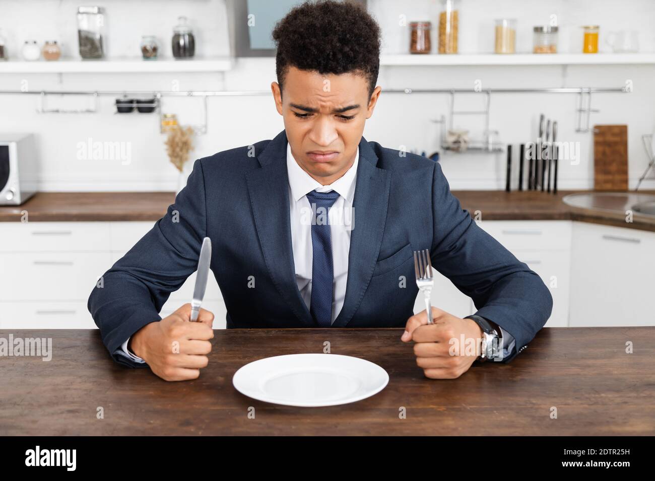Man empty plate hi-res stock photography and images - Alamy
