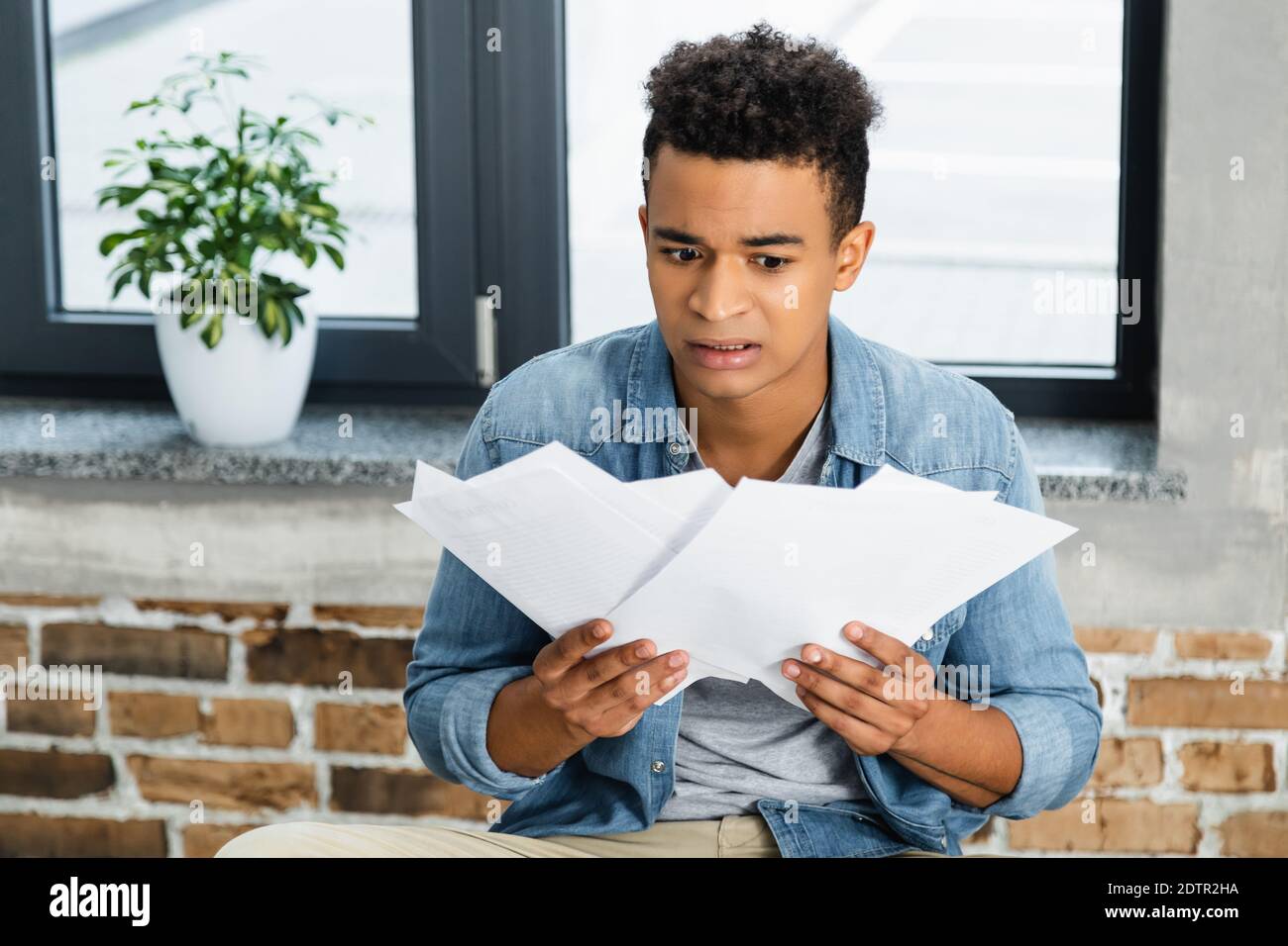 African american man documents hi-res stock photography and images - Alamy