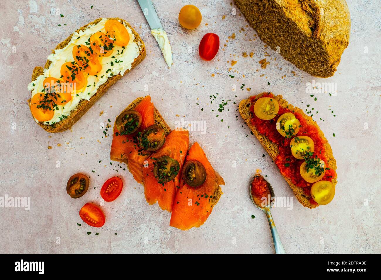 Open sandwiches made of brown integral bread. Slices of crunchy rounded ...