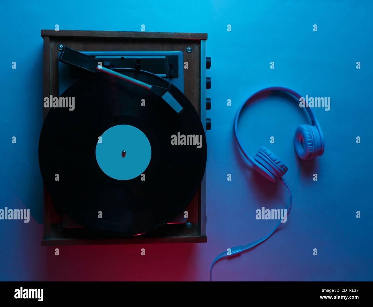 Vinyl player with lp record. Retro wave, neon light, ultraviolet ...