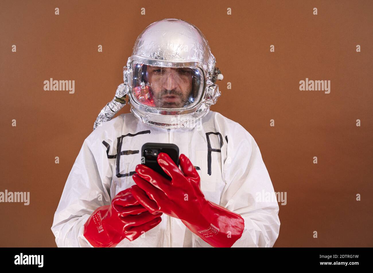Doctor in safety coverall looking hi-res stock photography and images ...