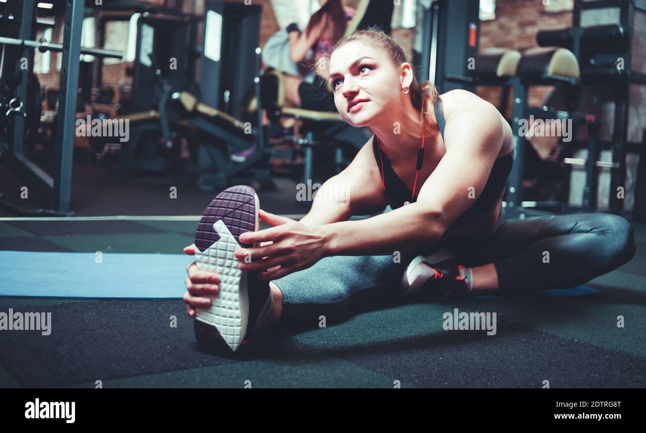 Stretching right leg hi-res stock photography and images - Alamy