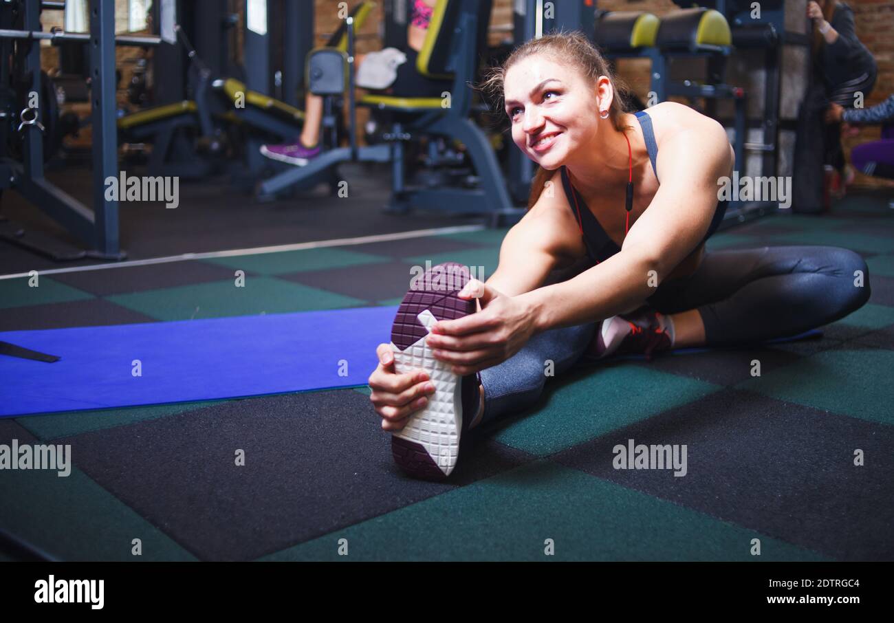 Stretching right leg hi-res stock photography and images - Alamy
