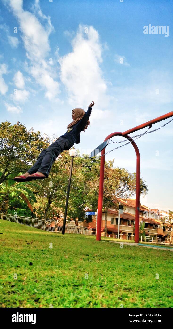 Child swing falling hi-res stock photography and images - Alamy