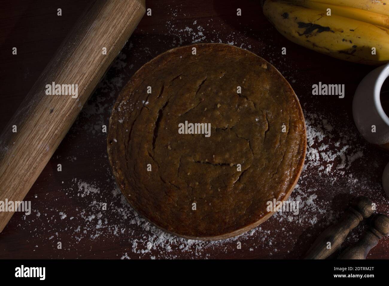 A homemade baked round banana cake with sugar Stock Photo - Alamy