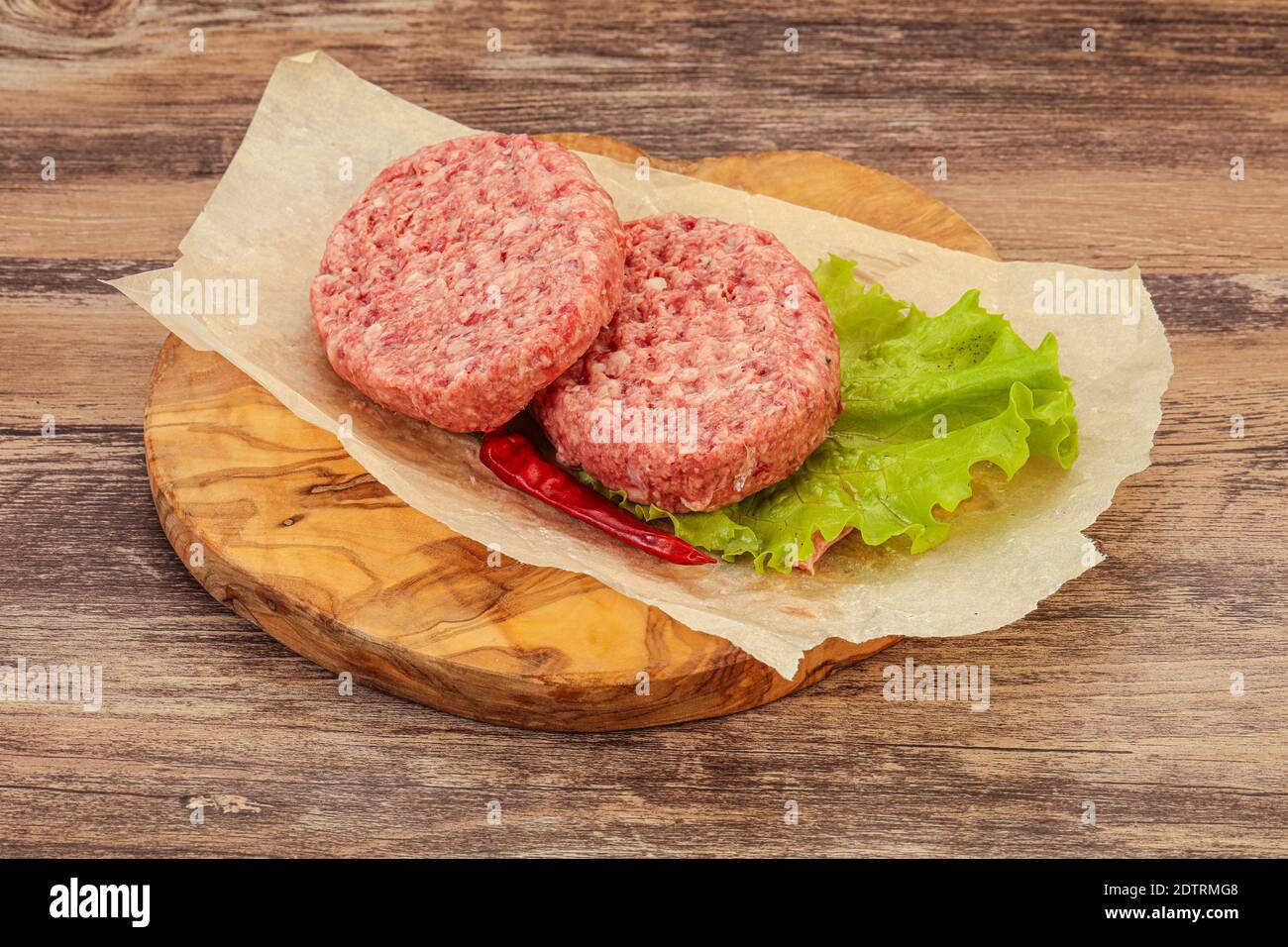 Raw beef meat cutlet for burger Stock Photo - Alamy