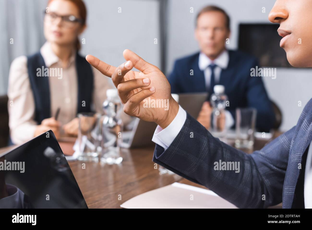 Close up view of african american businessman pointing with finger with ...