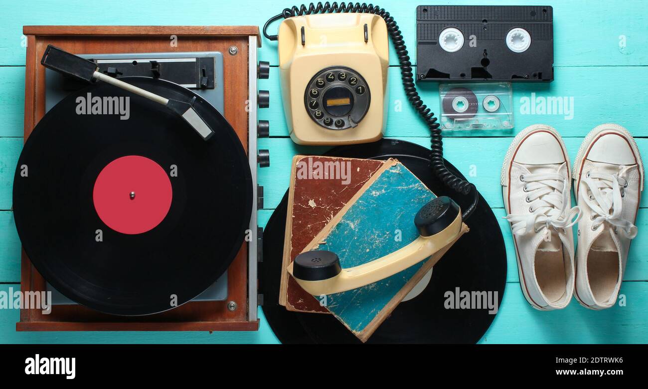 Obsolete objects on the Blue wooden background. Retro style, 80s, pop ...