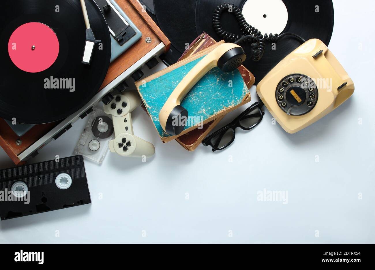 Retro 80s pop culture objects on white background. Copy space. Rotary ...