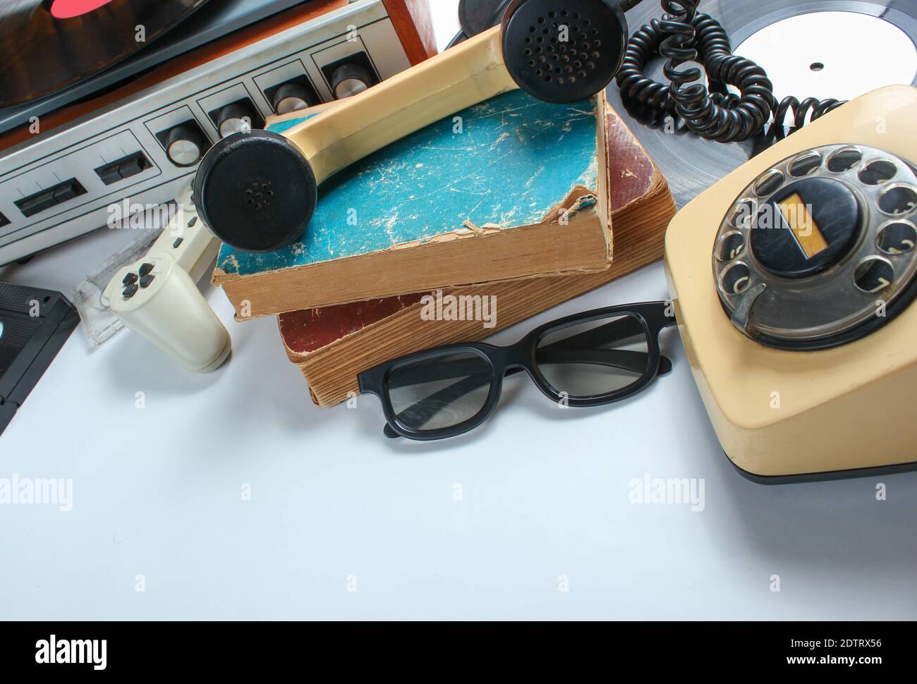 Retro 80s pop culture media objects on white background. Copy space ...