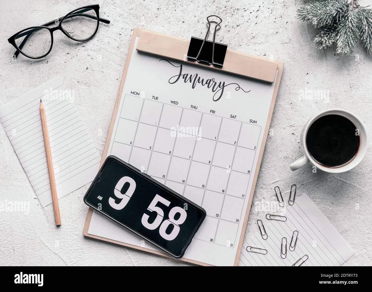 The flat lay of motivational concept - a calendar diary, flip clock ...