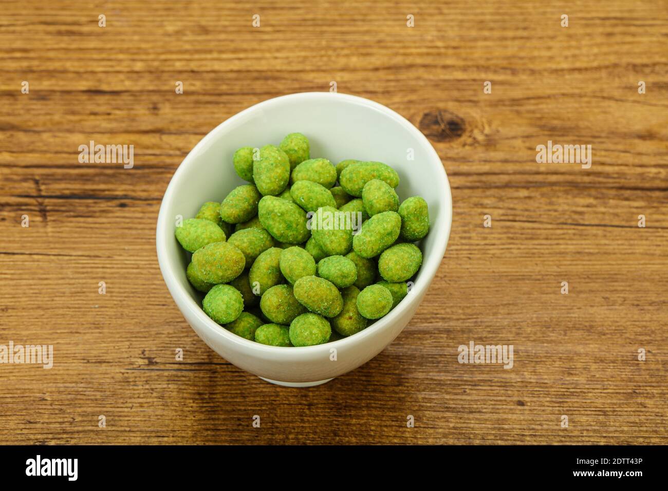 Spicy wasabi peanuts snack in the bowl Stock Photo - Alamy