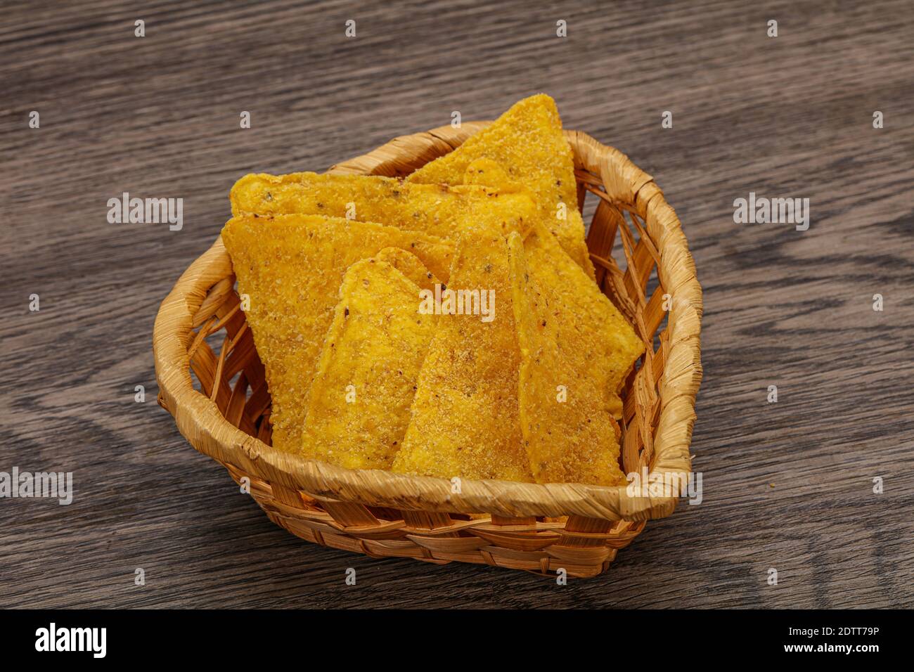 Mexican crunchy corn nachos triangle heap Stock Photo - Alamy