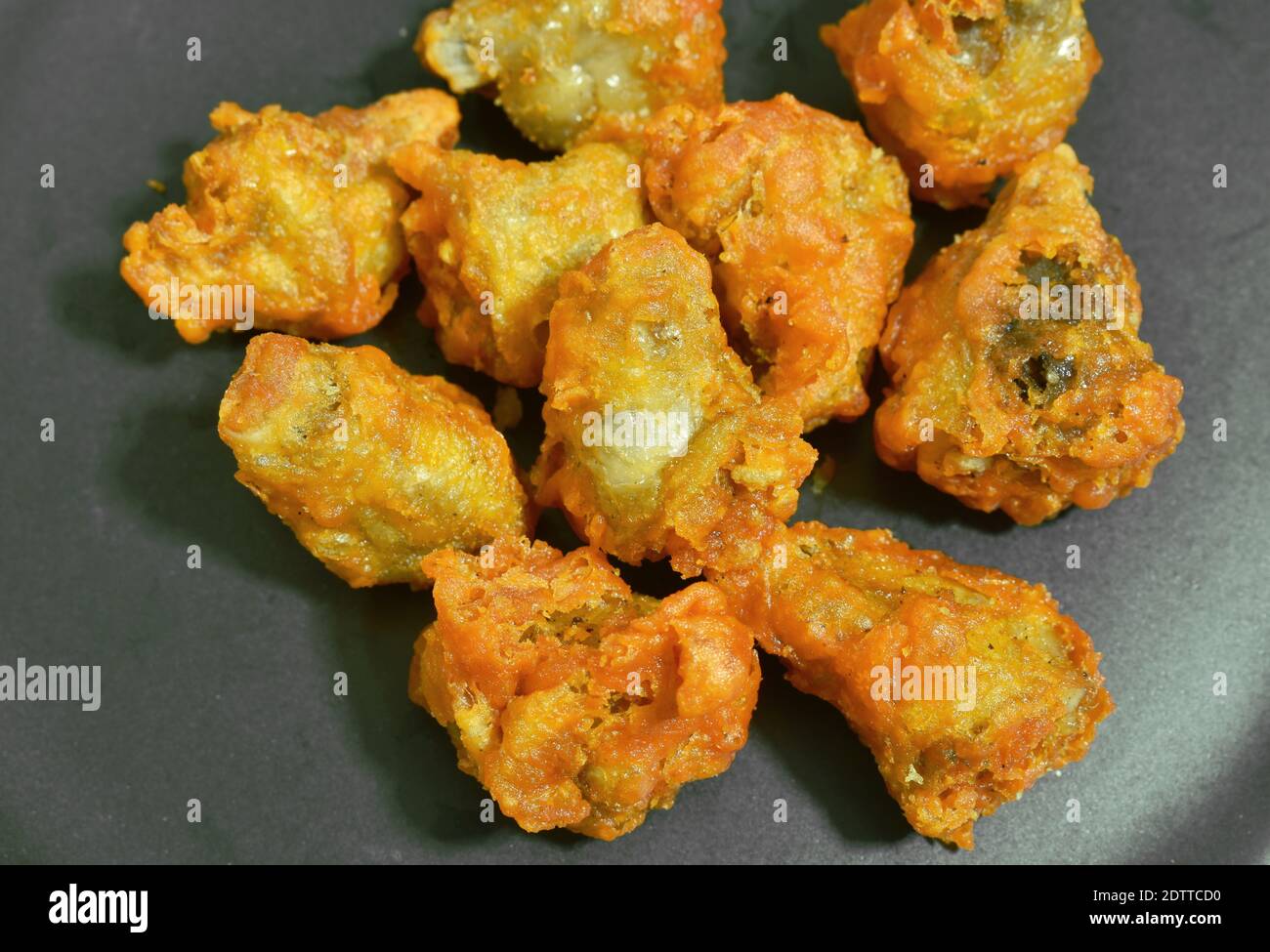 deep fried chicken leg tendon with flour on plate Stock Photo - Alamy
