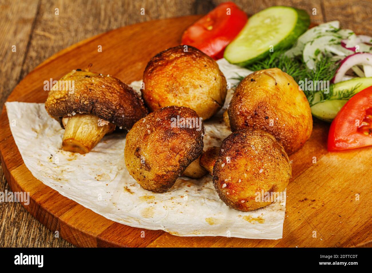 Grilled champignon with fresh vegetables and onion Stock Photo - Alamy