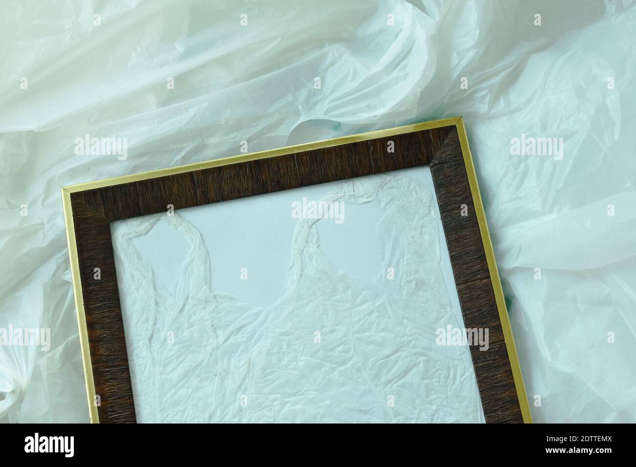 wooden picture frame on white plastic bag packing stacking Stock Photo ...