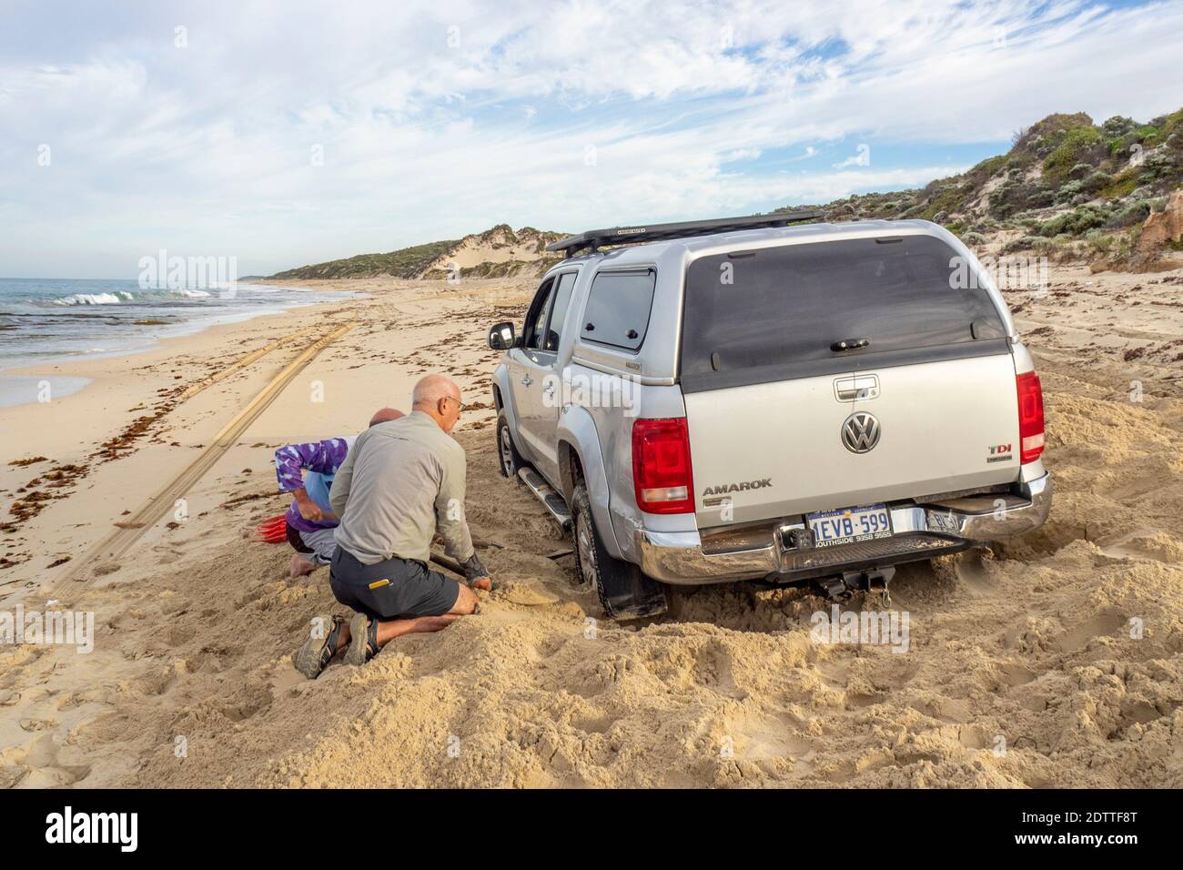 Shoveling sand hi-res stock photography and images - Alamy