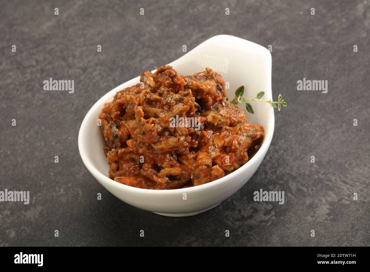 Canned anchovy snack in tomato sauce Stock Photo - Alamy