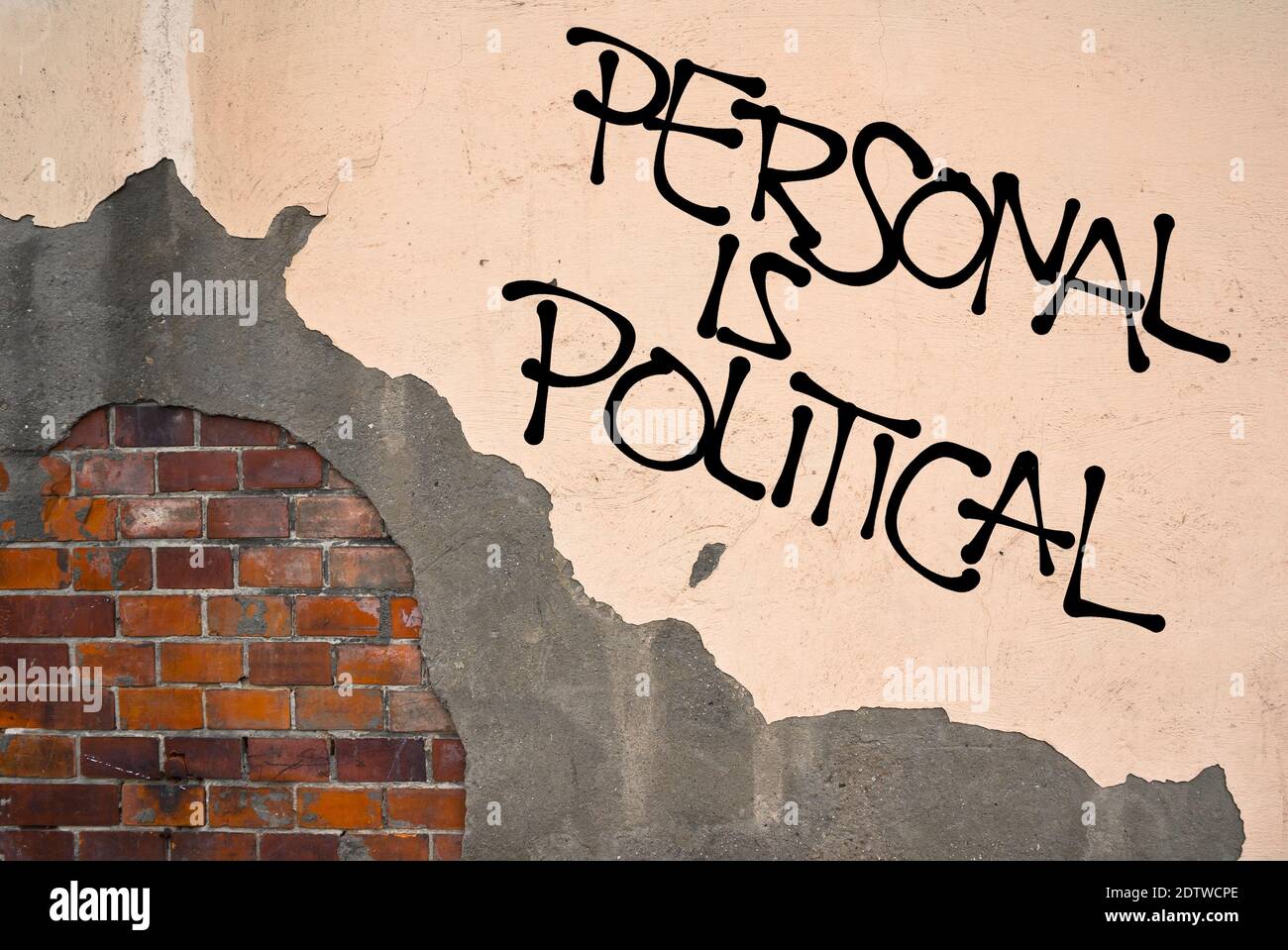 Handwritten graffiti Personal Is Political sprayed on wall, anarchist ...