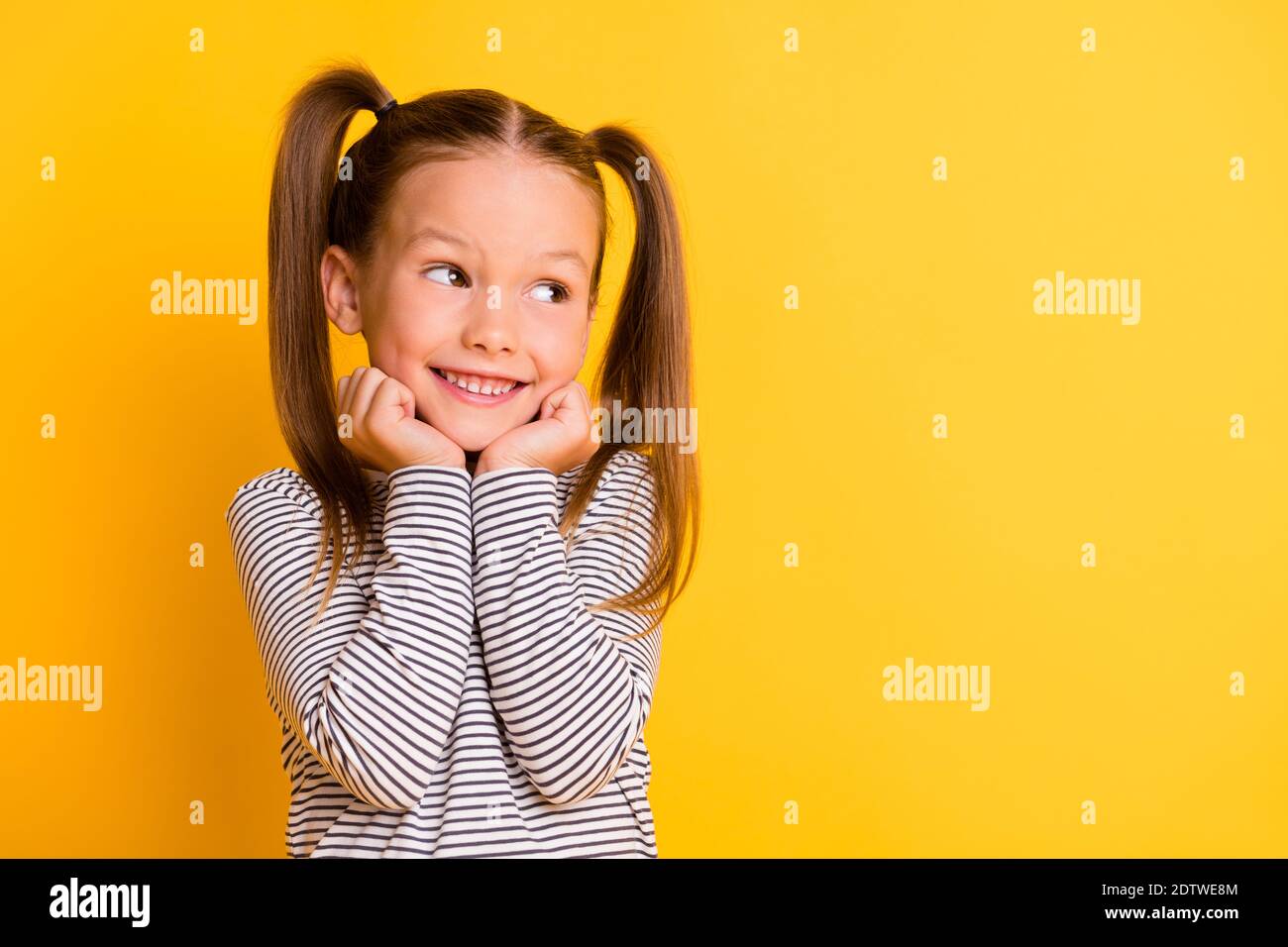 Portrait of young cute adorable smiling girl child kid hold hands under ...
