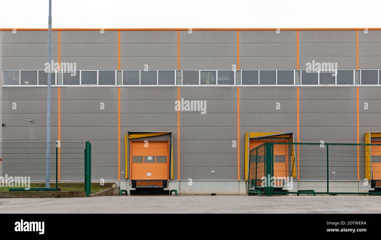 Loading Cargo Dock Doors at Distribution Warehouse Stock Photo - Alamy