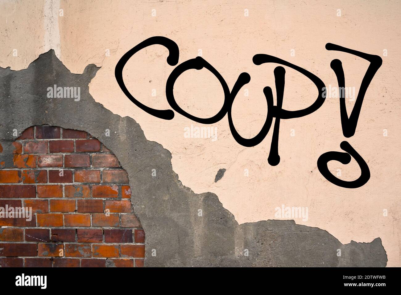 Coup - Handwritten graffiti sprayed on the wall, anarchist aesthetics ...