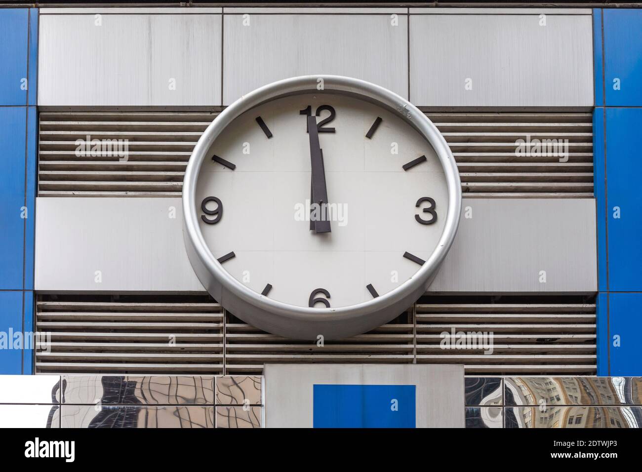 Big Round Analog Clock at Building in Hong Kong Stock Photo - Alamy