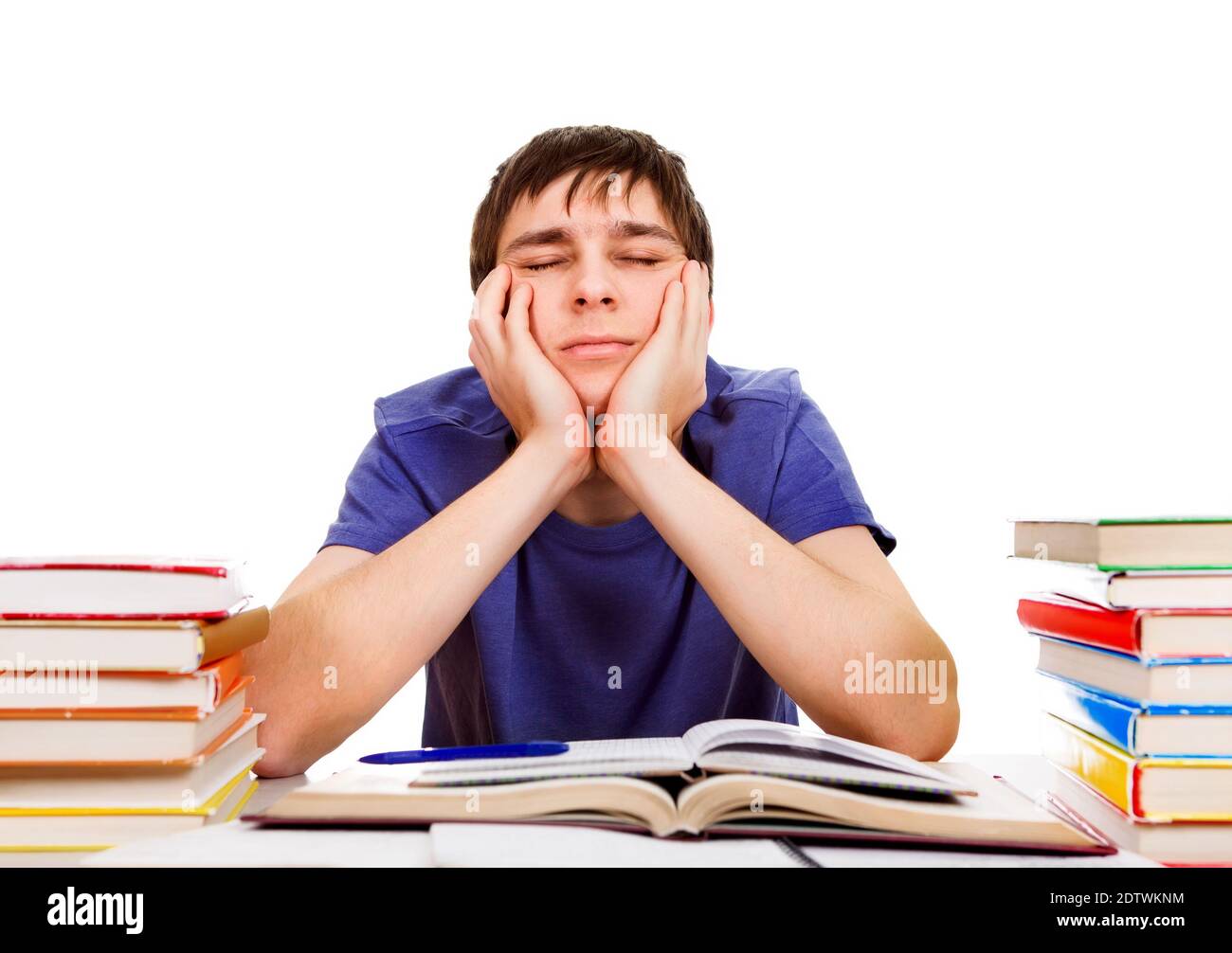 Tired Student at the Writing Table on the White Background Stock Photo ...