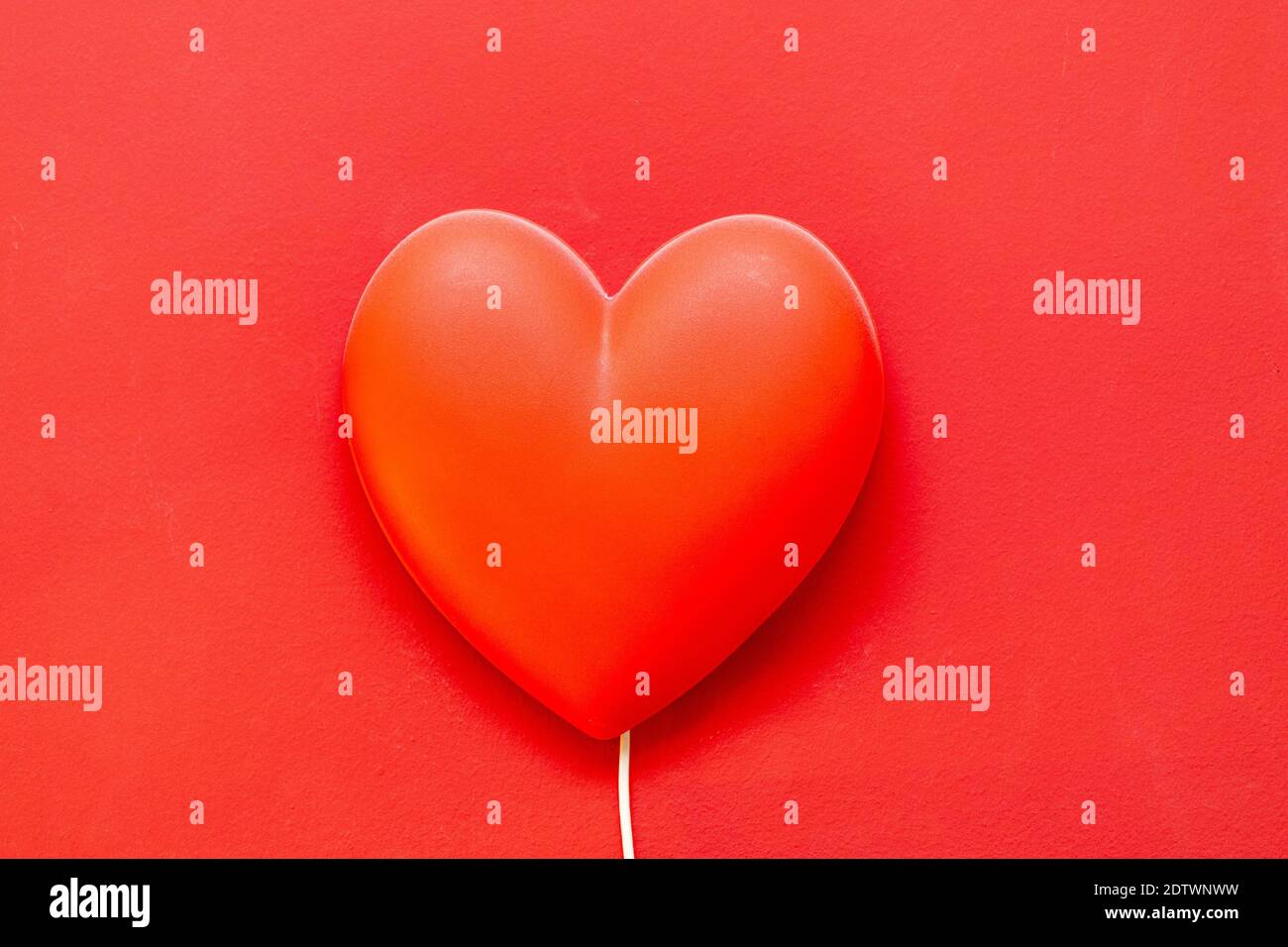 Big Red Heart Shape at Wall Love Concept Stock Photo - Alamy