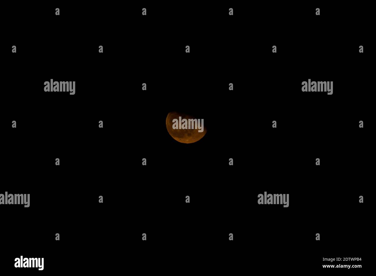 Half moon against black sky during night time Stock Photo - Alamy