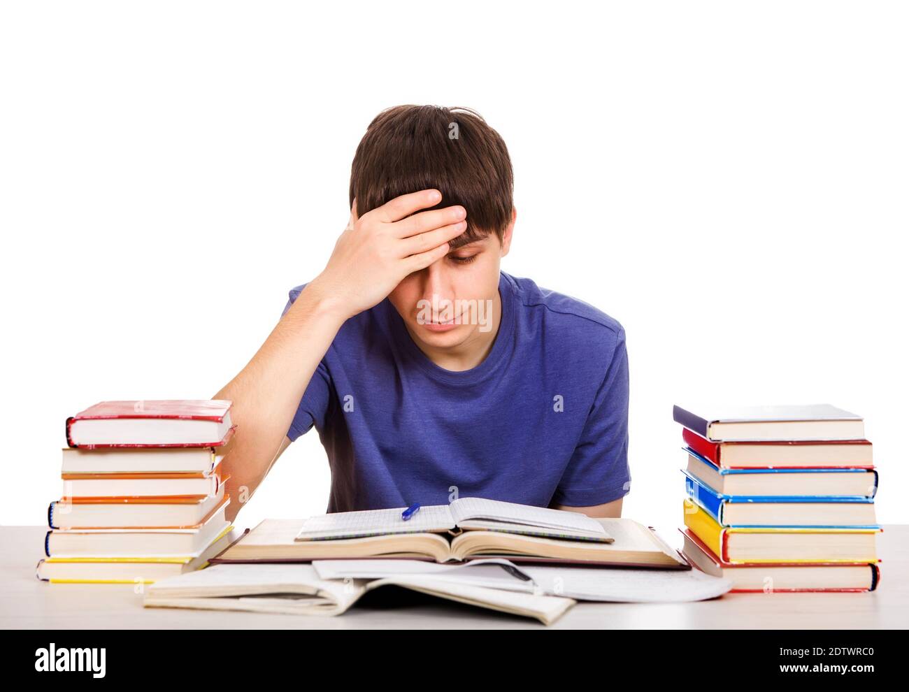 Tired and Troubled Student at the Writing Table on the White Background ...