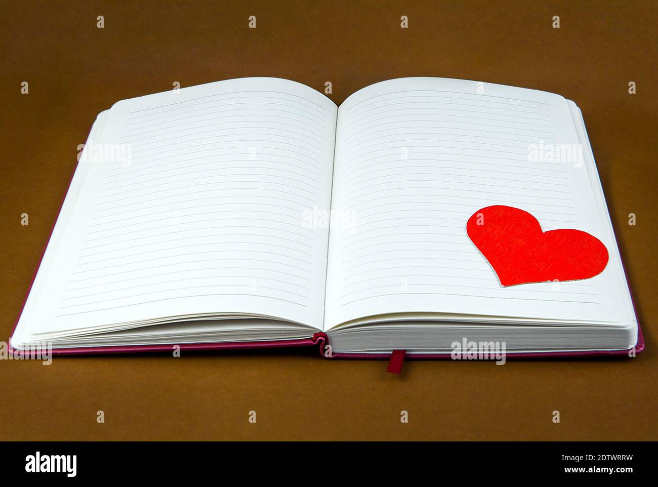 Blank Writing Pad with Red Heart Shape on the Brown Paper Background ...