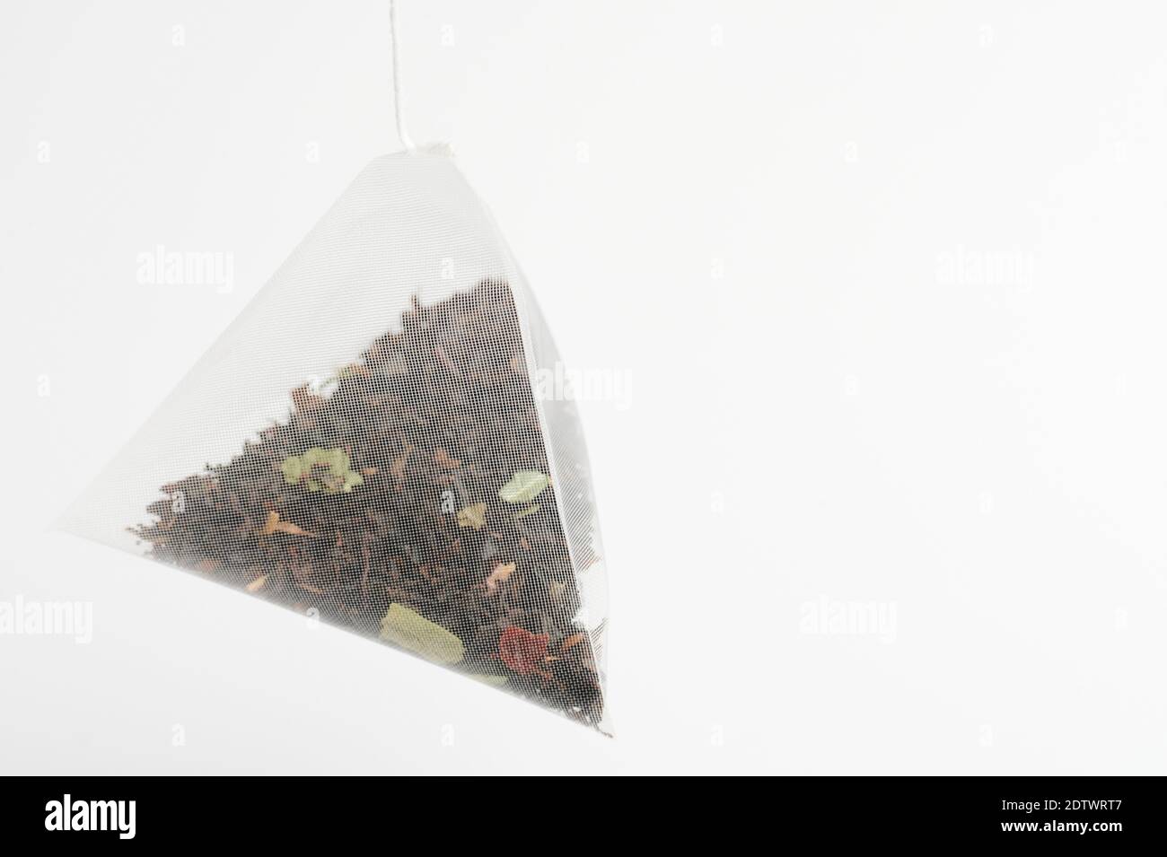 Triangular shape tea bag isolated on white studio background Stock ...